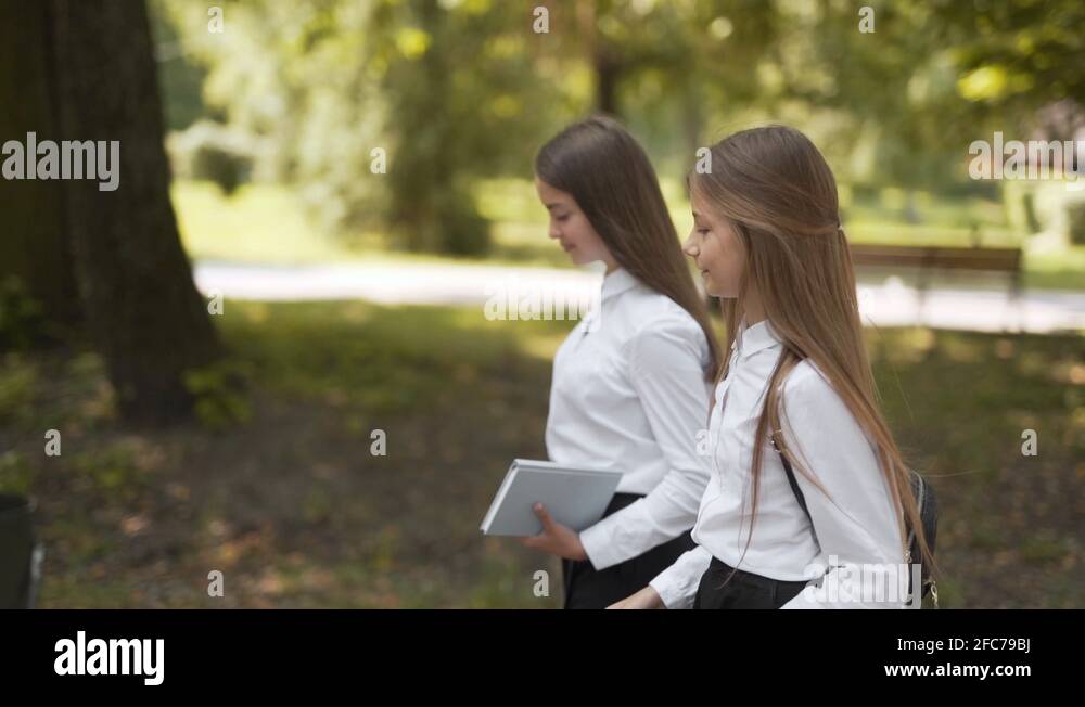 Teen girl walking into school uniform Stock Videos & Footage - HD and ...