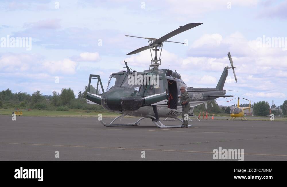 Sheriff gets ready to seat in front of King County Sheriff's helicopter ...