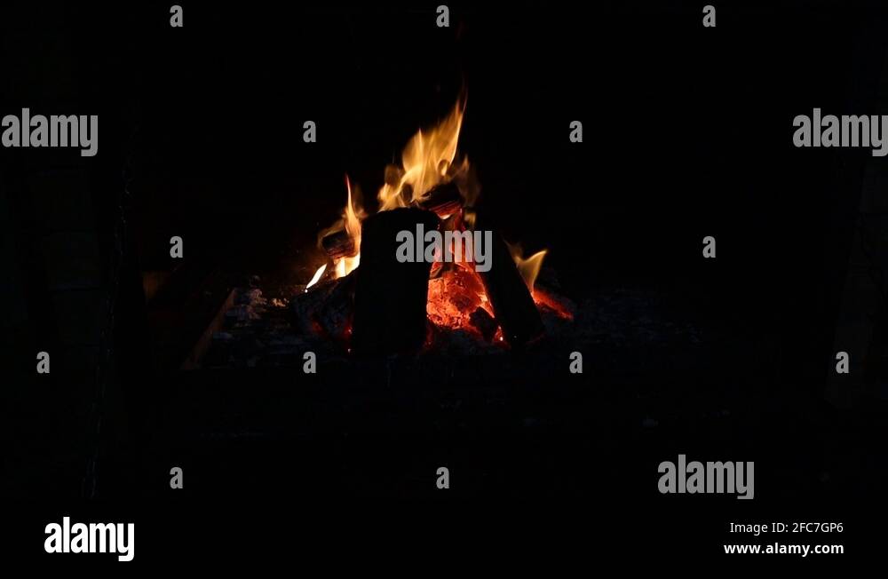 A big braai/barbeque fire with big flames and sparks Stock Video ...