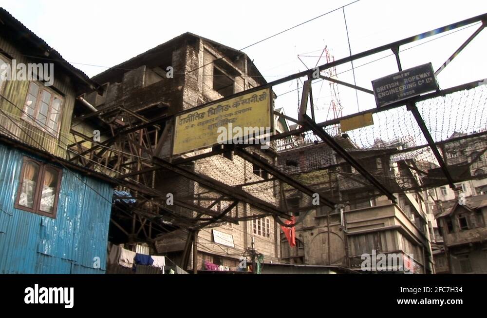 A back-street scene in Calcutta, India. Camera shot from below looking ...