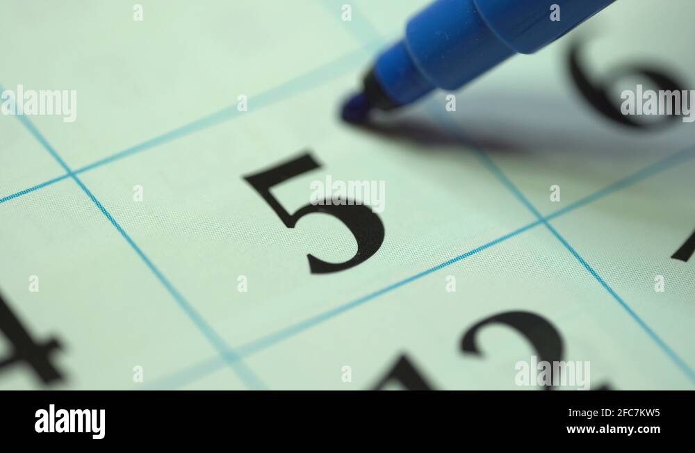 5th – fifth day of the month. The woman marks the calendar date Stock ...