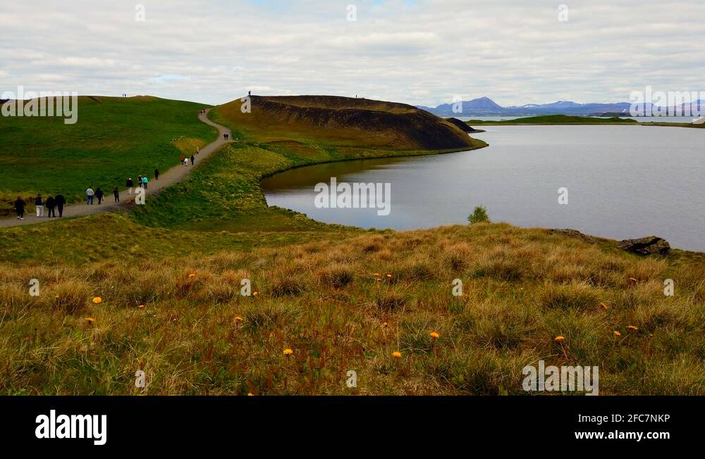 Iceland Midge Lake or Myvatn volcanic lake and pseudo-craters wide pan ...