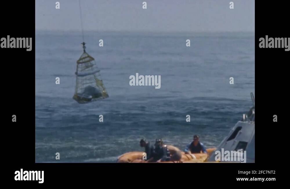 Apollo 11 - Sikorsky helicopter with rescue basket fly over lunar modul ...