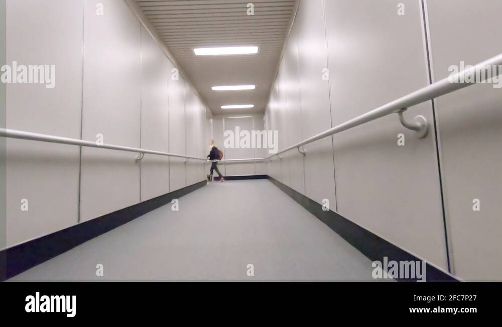 Inside of the aircraft bridge connecting airport terminal and passenger ...