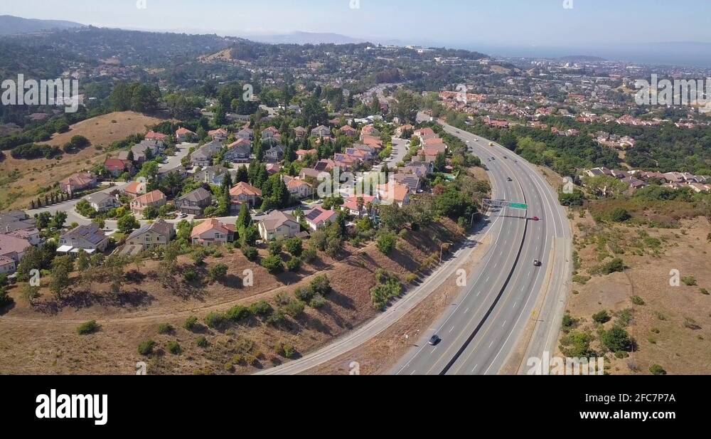 Aerial of houses and highway in suburbs of san mateo county, sf bay ...