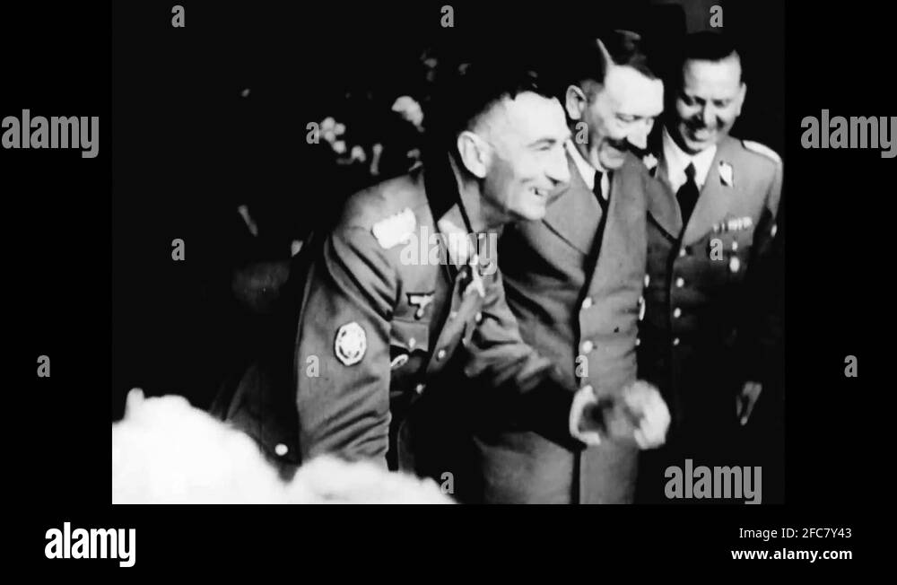 WW2 - Adolf Hitler with headquarters personnal at map planning Stock ...