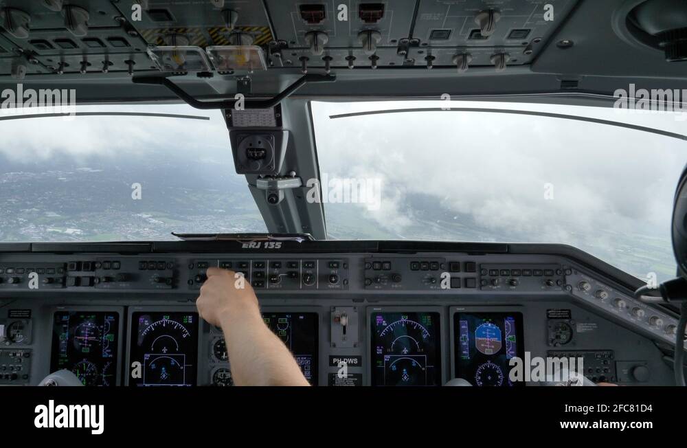 Embraer E135 Airplane Inflight. Pilot Cockpit Control Panel and Windows ...
