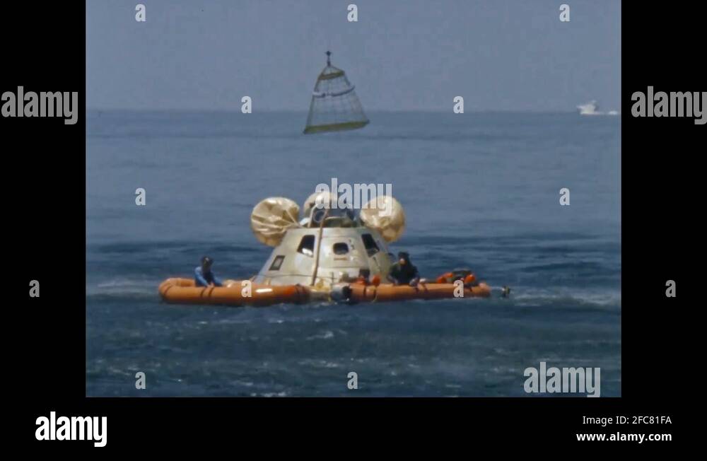 Apollo 11 - Sikorsky helicopter with rescue basket fly over lunar modul ...