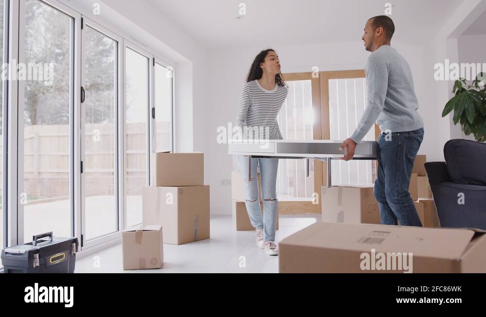 Couple moving table Stock Videos & Footage - HD and 4K Video Clips - Alamy