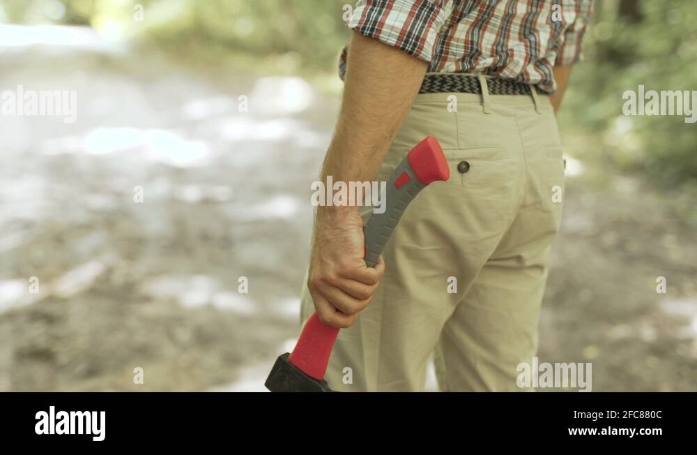 Hand holding axe Stock Videos & Footage - HD and 4K Video Clips - Alamy