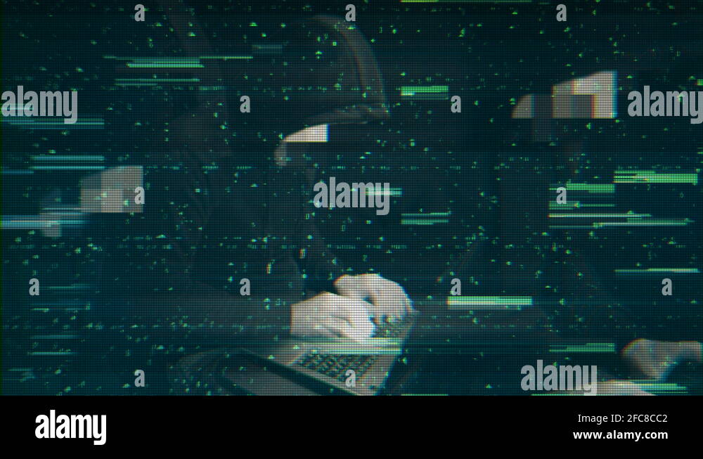 Hacker hided face is working at the computer digital background Stock ...