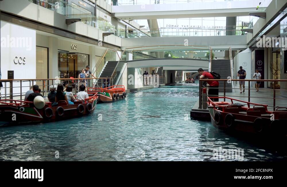 Luxury Mall With Waterway and Boat Ride at Marina Bay Sands in ...