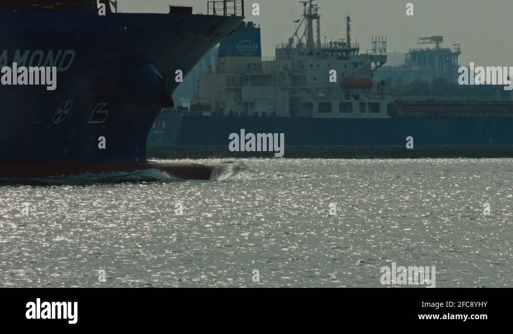 Large loaded container ship BG Diamond leaving port in Rotterdam. His ...