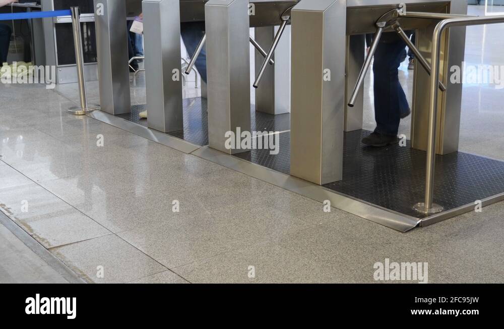 Automatic turnstile with sliding doors to control the flow of people ...