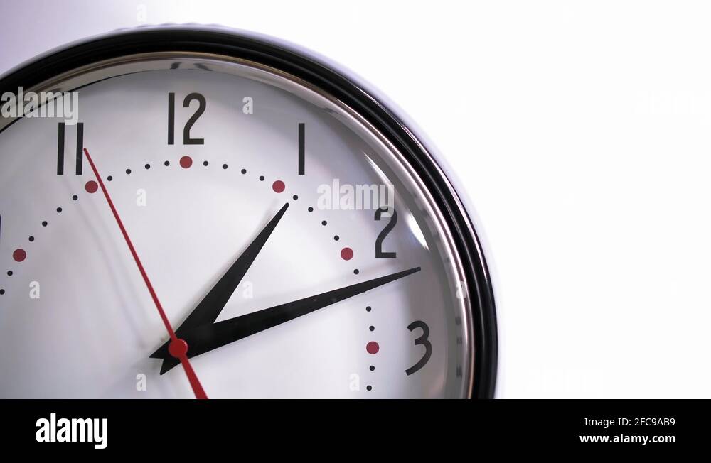 Analog Clock Face with Clock Hands on White Background Stock Video ...