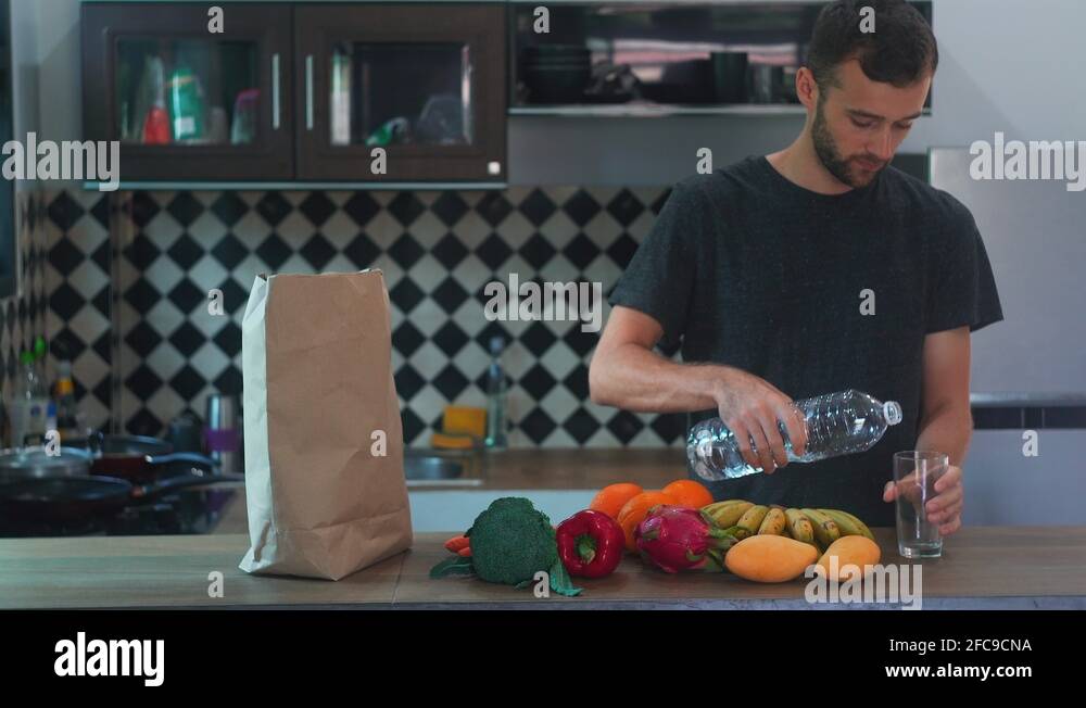 Man pouring water into glass Stock Videos & Footage - HD and 4K Video ...