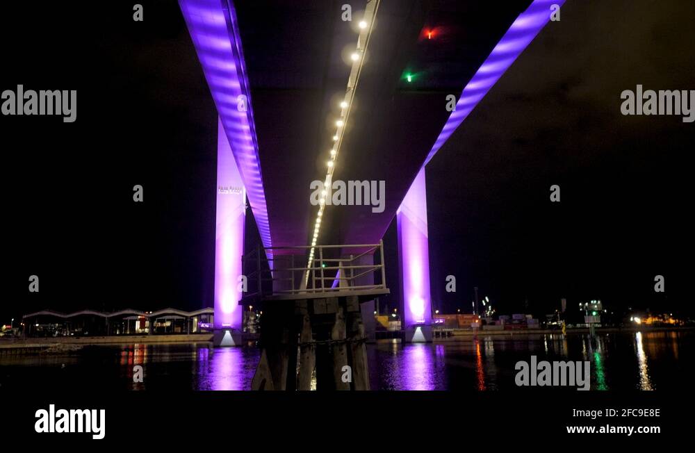 Bolte Bridge in docland nighttime with illuminated color on water Stock ...