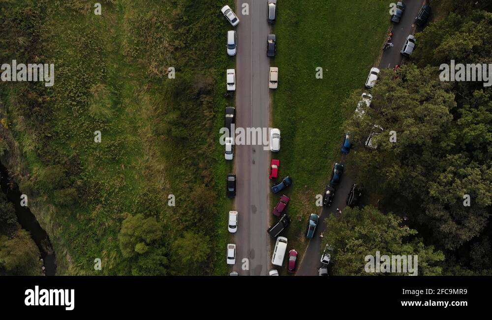 Many cars lined the roadside. Top view, flyover Stock Video Footage - Alamy