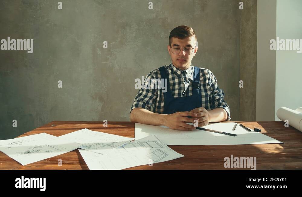 Disabled. Prosthetic arm. Engineer draw construction design plan. Work ...