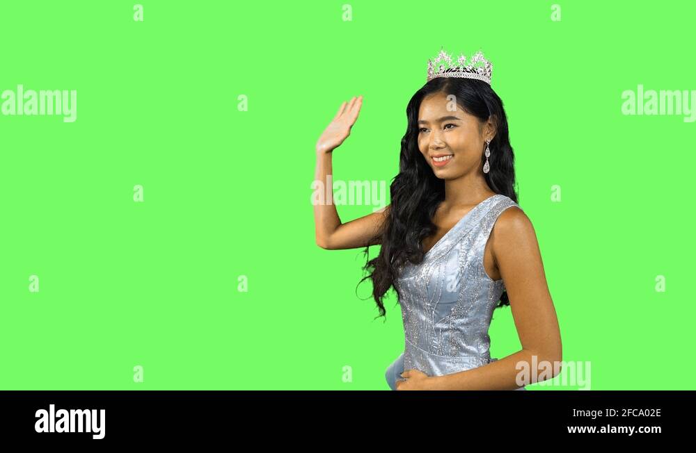 Pageant winner smiles and waves - green screen keyable background Stock ...