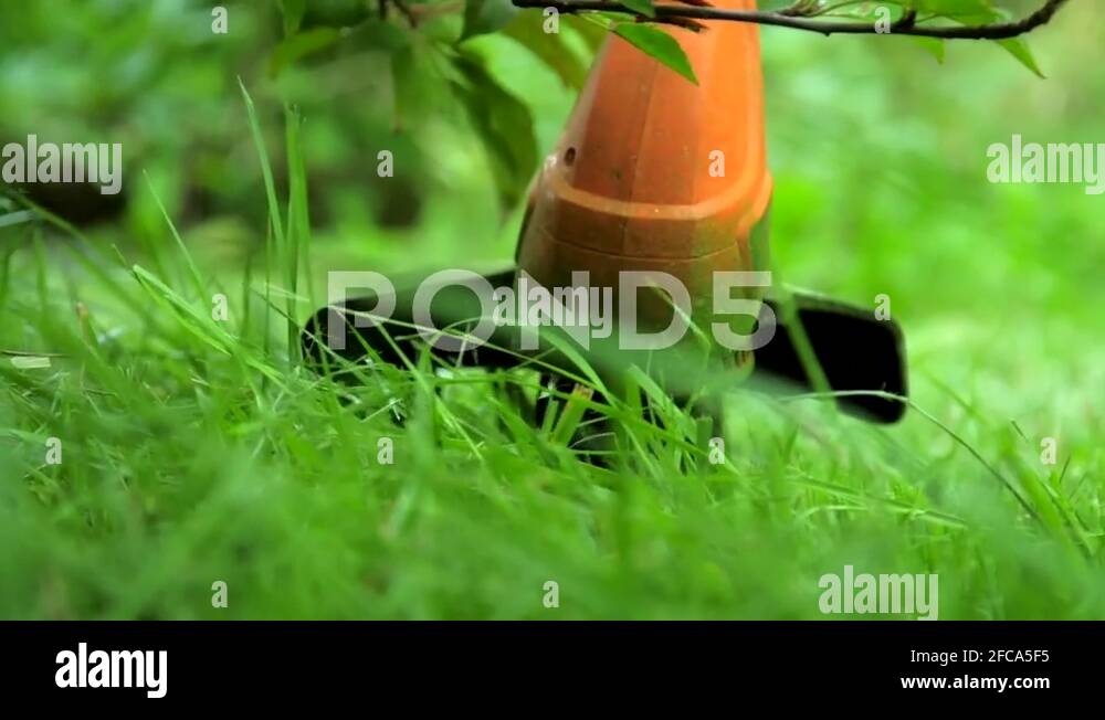 Modern grass cutter Stock Videos & Footage - HD and 4K Video Clips - Alamy