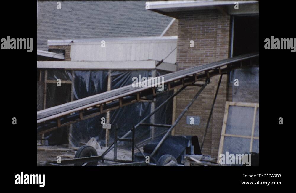 1960s Conveyor Belt Loads Cement Construction Site Cement Vintage Film ...