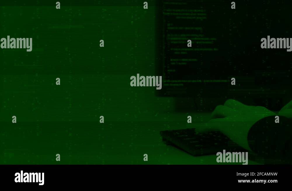 Green background programmer hands close up typing code on keyboard ...