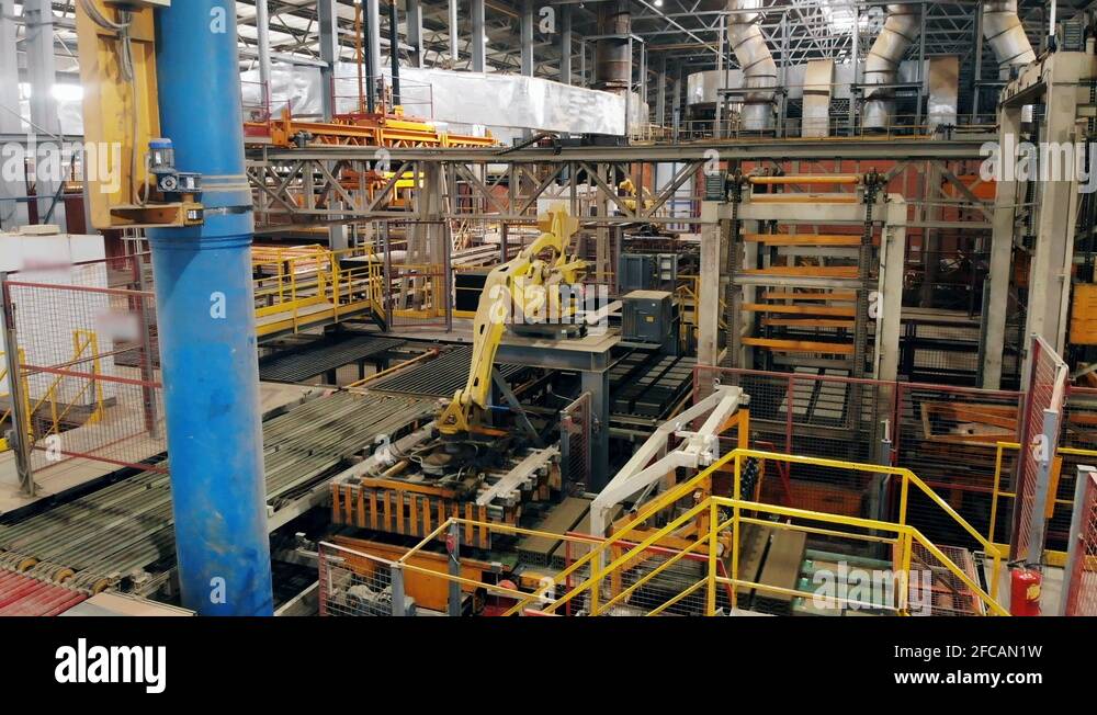 Working industrial mechanism moves bricks at a factory Stock Video ...