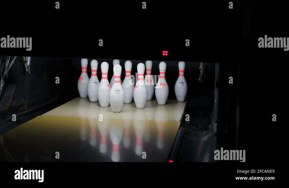 STRIKE!!! A bowling ball hits all 10 Pins and creating a STRIKE at the ...