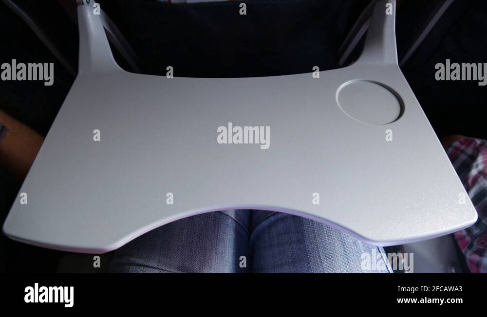 Airline tray table Stock Videos & Footage - HD and 4K Video Clips - Alamy