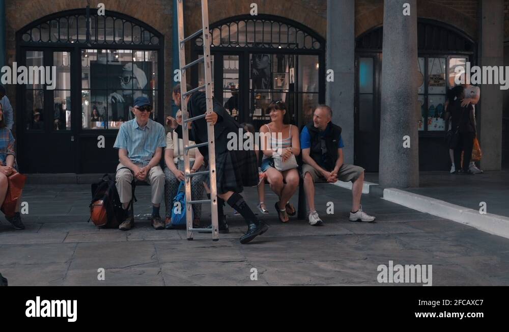 Holding a ladder Stock Videos & Footage - HD and 4K Video Clips - Alamy