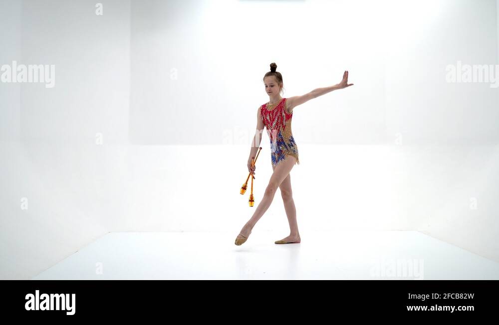 A girl gymnast performs exercises with a mace Stock Video Footage - Alamy