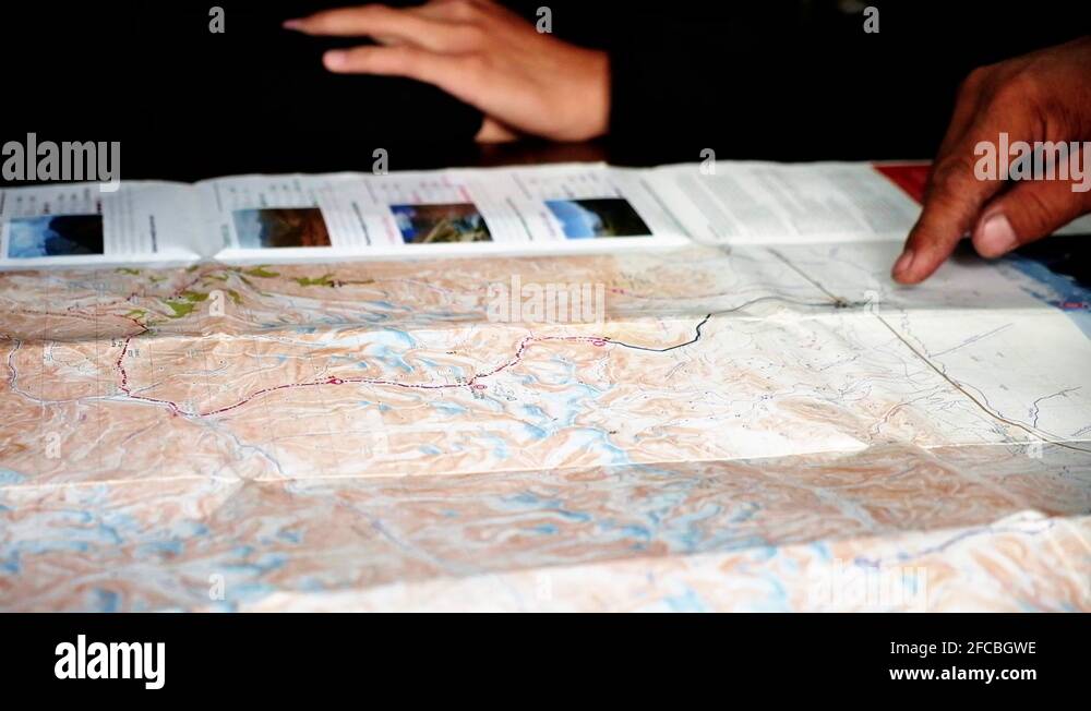 Reading a map trail Stock Videos & Footage - HD and 4K Video Clips - Alamy