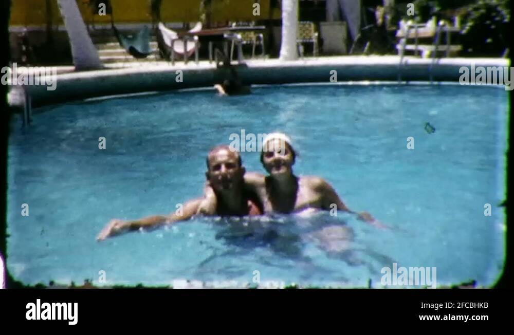 LOVING COUPLE in Swimming Pool Florida Resort 1960s Vintage Film Home ...