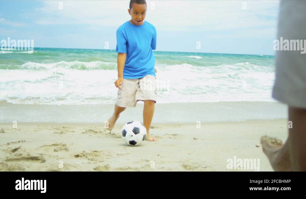 Boys brothers playing football soccer Stock Videos & Footage - HD and ...