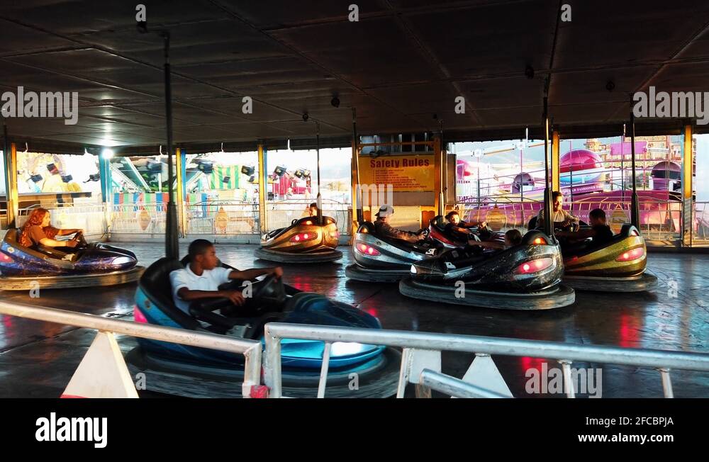 Kids Ride Carnival Bumper Cars, Pull Back Reveal of Scooter Lettering ...