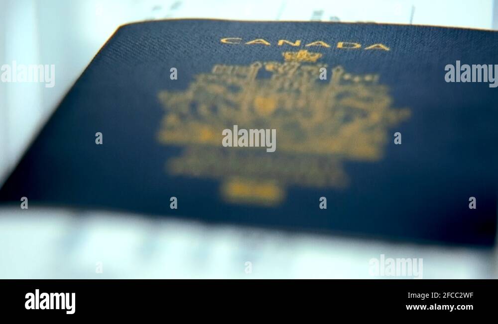 Close Up Canadian Passport with Boarding Pass - At 24 fps Stock Video ...