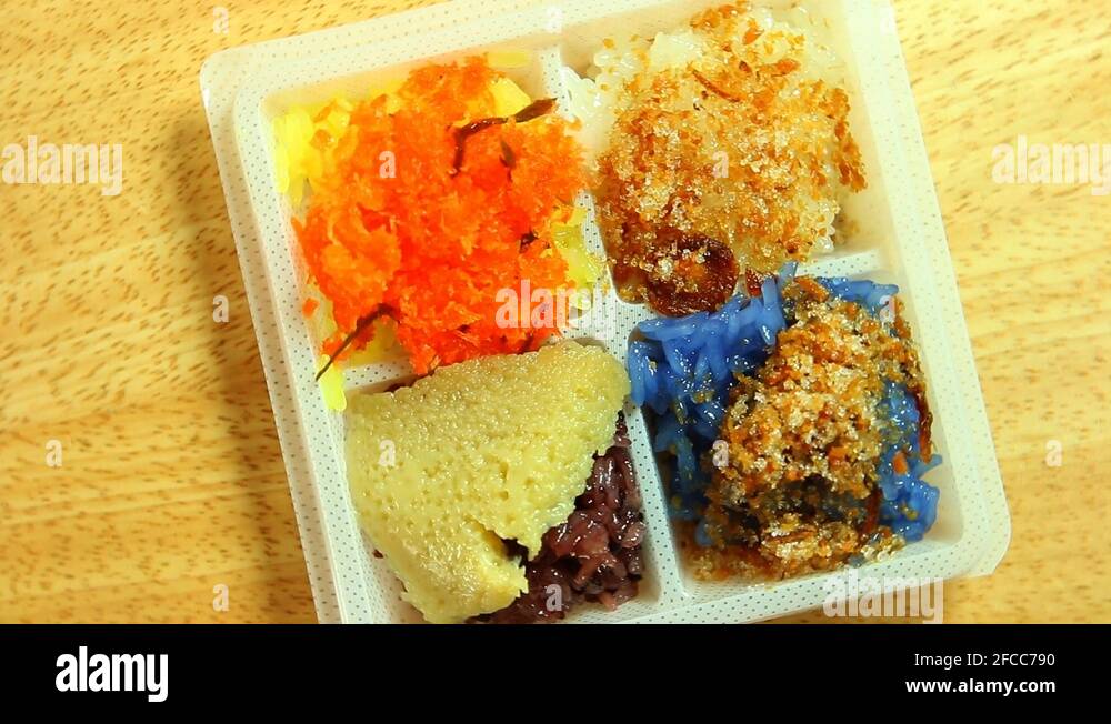 Thai sweet sticky rice with topping, Thai dessert Stock Video Footage ...