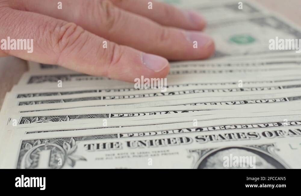 Person counting dollar banknotes in hands. Stitch of money. Rich man ...