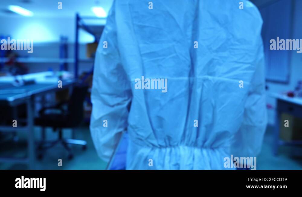 Engineers wear safety suits in the laboratory Stock Video Footage - Alamy