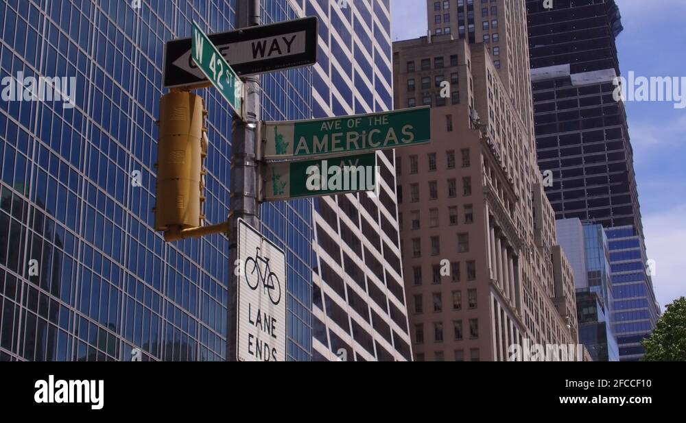 Street sign of the Sixth Avenue in Midtown Manhattan, New York at ...