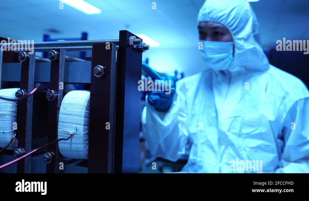 Engineers wear safety suits in the laboratory Stock Video Footage - Alamy