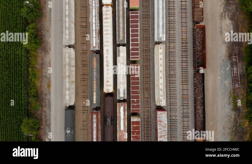 4k top down viewing from top to bottom showing multiple trains while ...