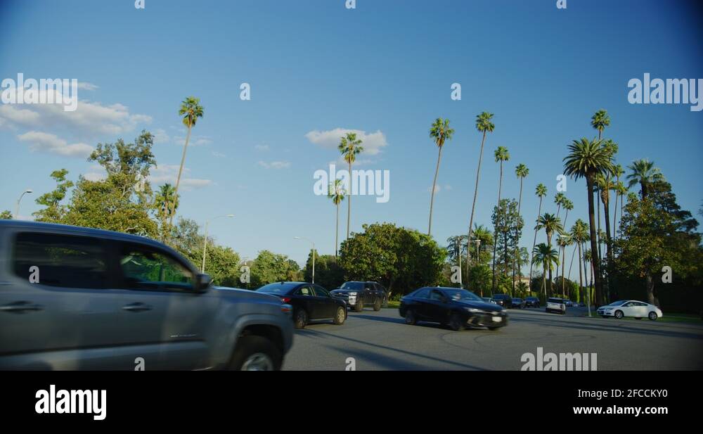 Traffic at the famous 6-way stop street intersection in Beverly Hills ...