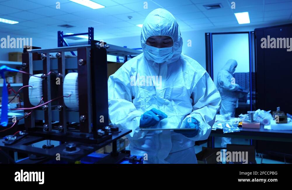 Scientist wear safety suits in the laboratory Stock Video Footage - Alamy