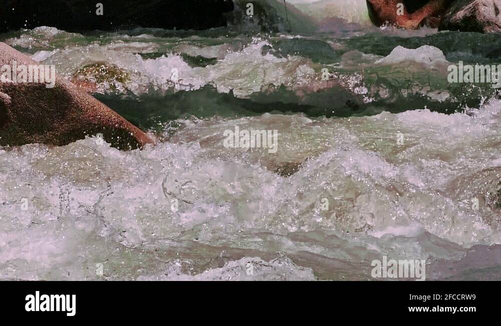 Cinematic close up shot of Ganges river crystal clear water flowing ...
