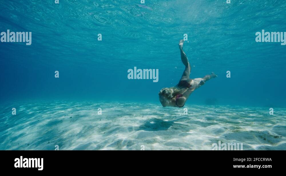 Beautiful woman swimming to the surface Stock Videos & Footage - HD and ...