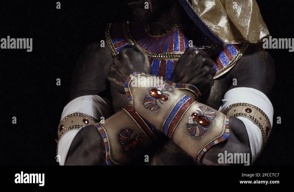 Close up of Anubis with his hands crossed, long claws, spreading his ...