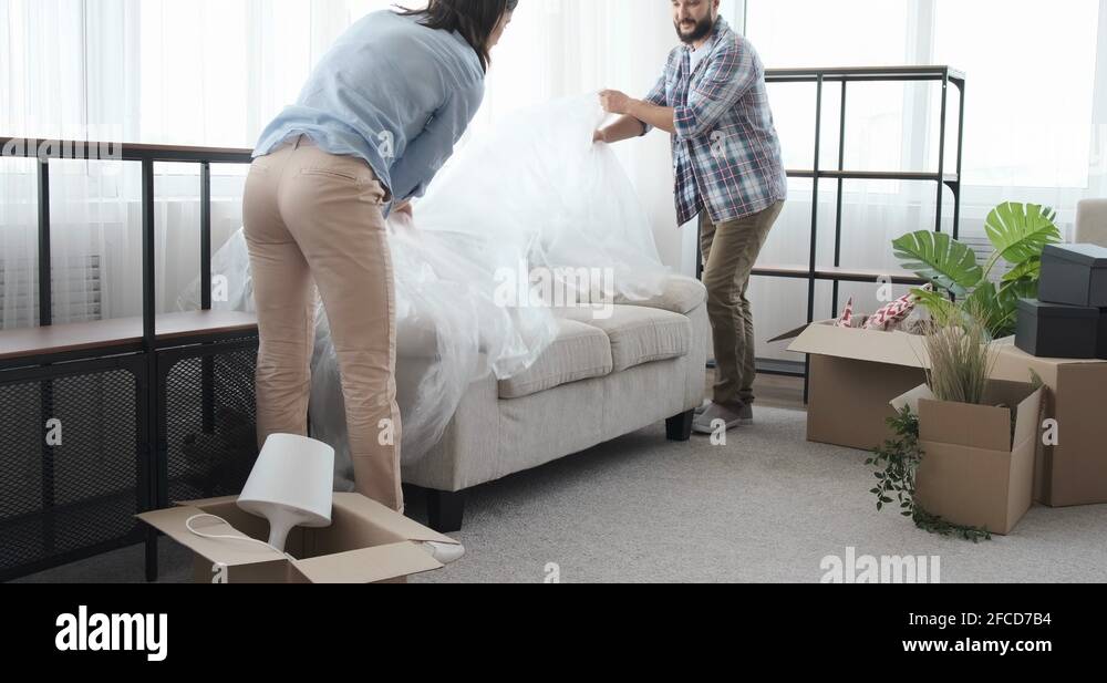 Falling on to sofa Stock Videos & Footage - HD and 4K Video Clips - Alamy