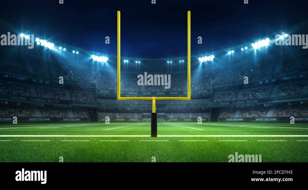 American football stadium with yellow goal post and fans under shining ...